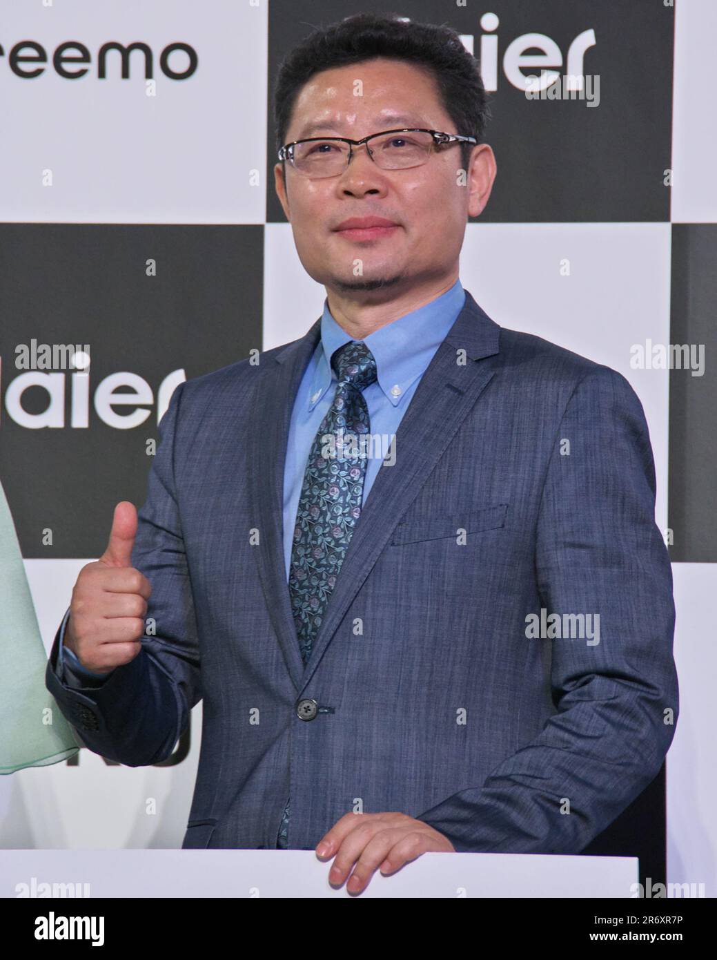 Vice president of Haier Group Du Jingguo attends a press conference for ...