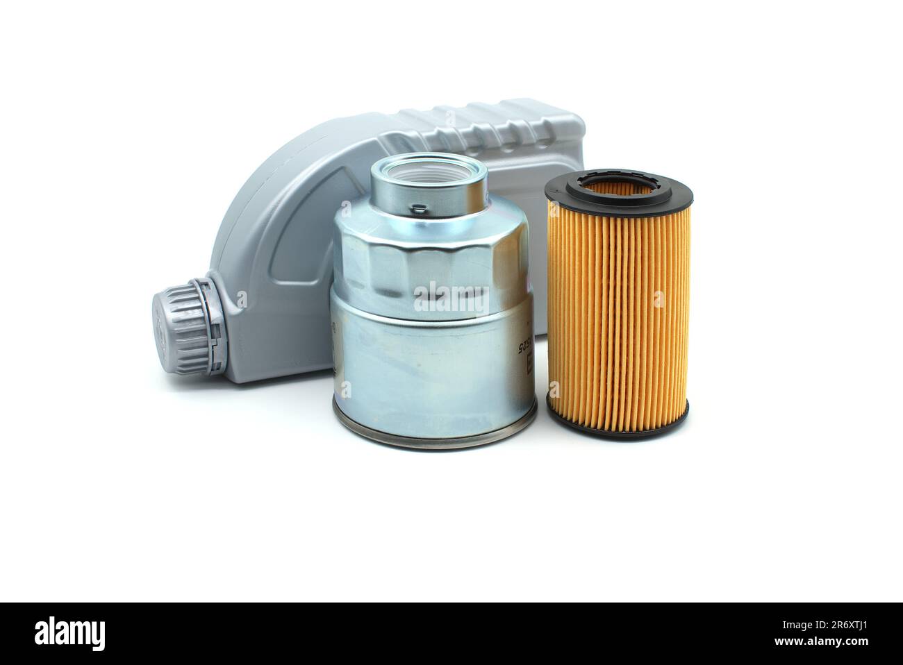 Motor oil filters and oil container isolated on a white background. Car ...