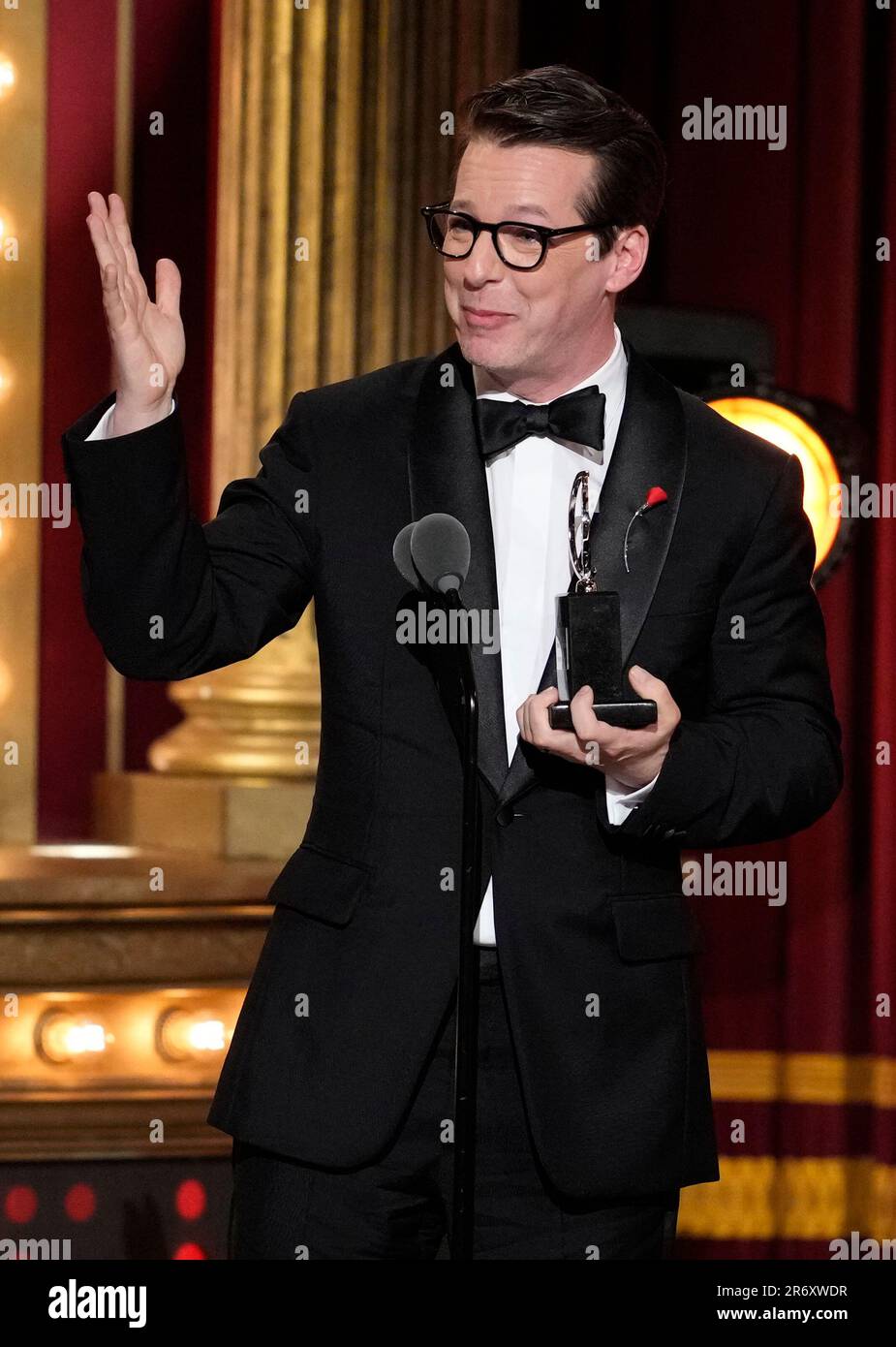 Sean Hayes accepts the award for best performance by an actor in a ...