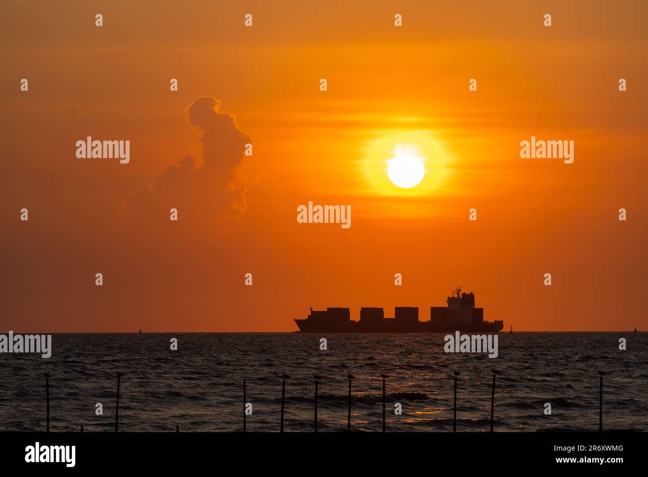 Bulk carrier ship sunset in sea hi-res stock photography and images - Alamy