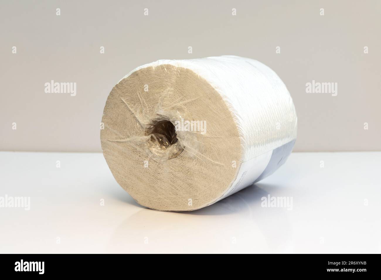 Paper towels roll on white isolated background Stock Photo - Alamy