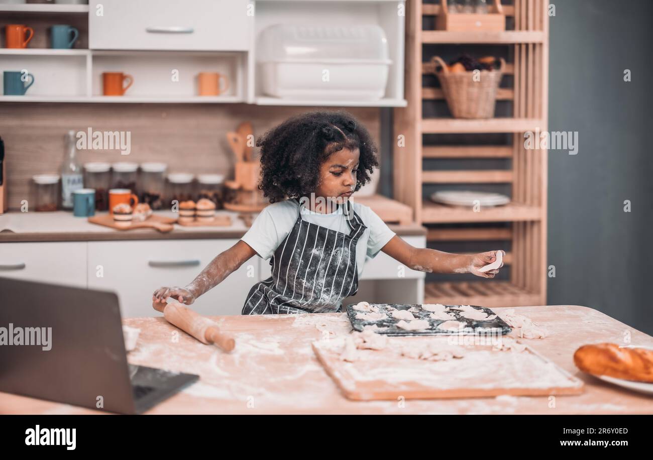 Family members cook homemade pizza dough in funny and playful ways ...