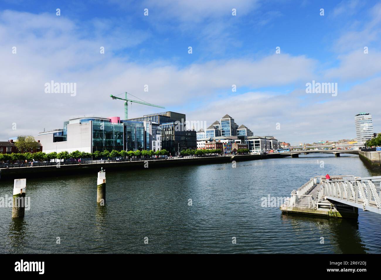 Modern buildings along the banks of River Liffey in Dublin, Ireland ...