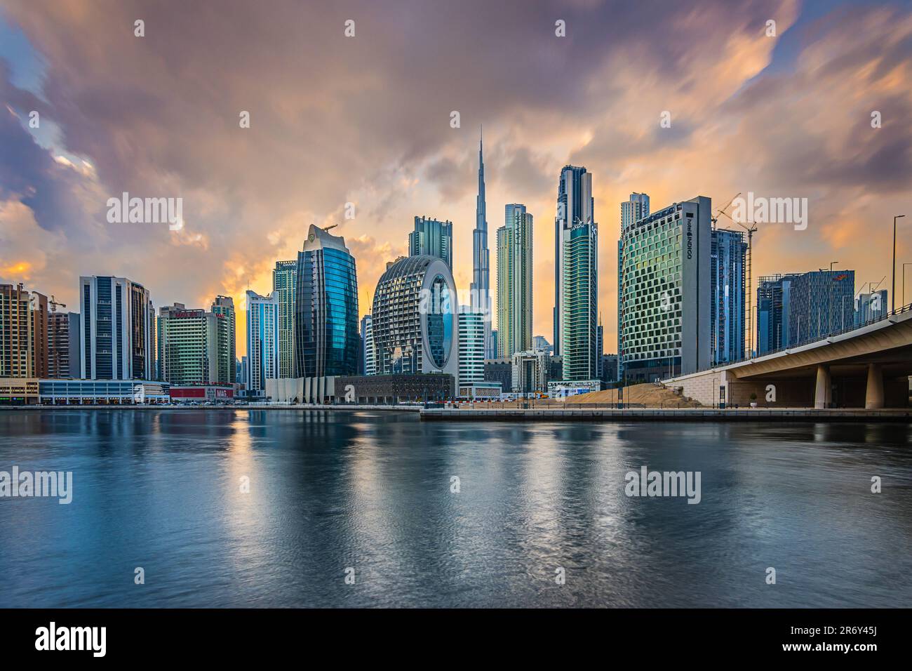 View of the Dubai skyline in the evening. Sunset over the skyscrapers ...