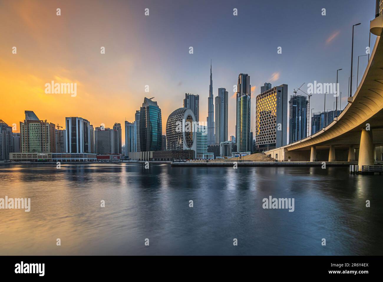 Evening mood with a view of the Dubai skyline at sunset.. High-rise ...