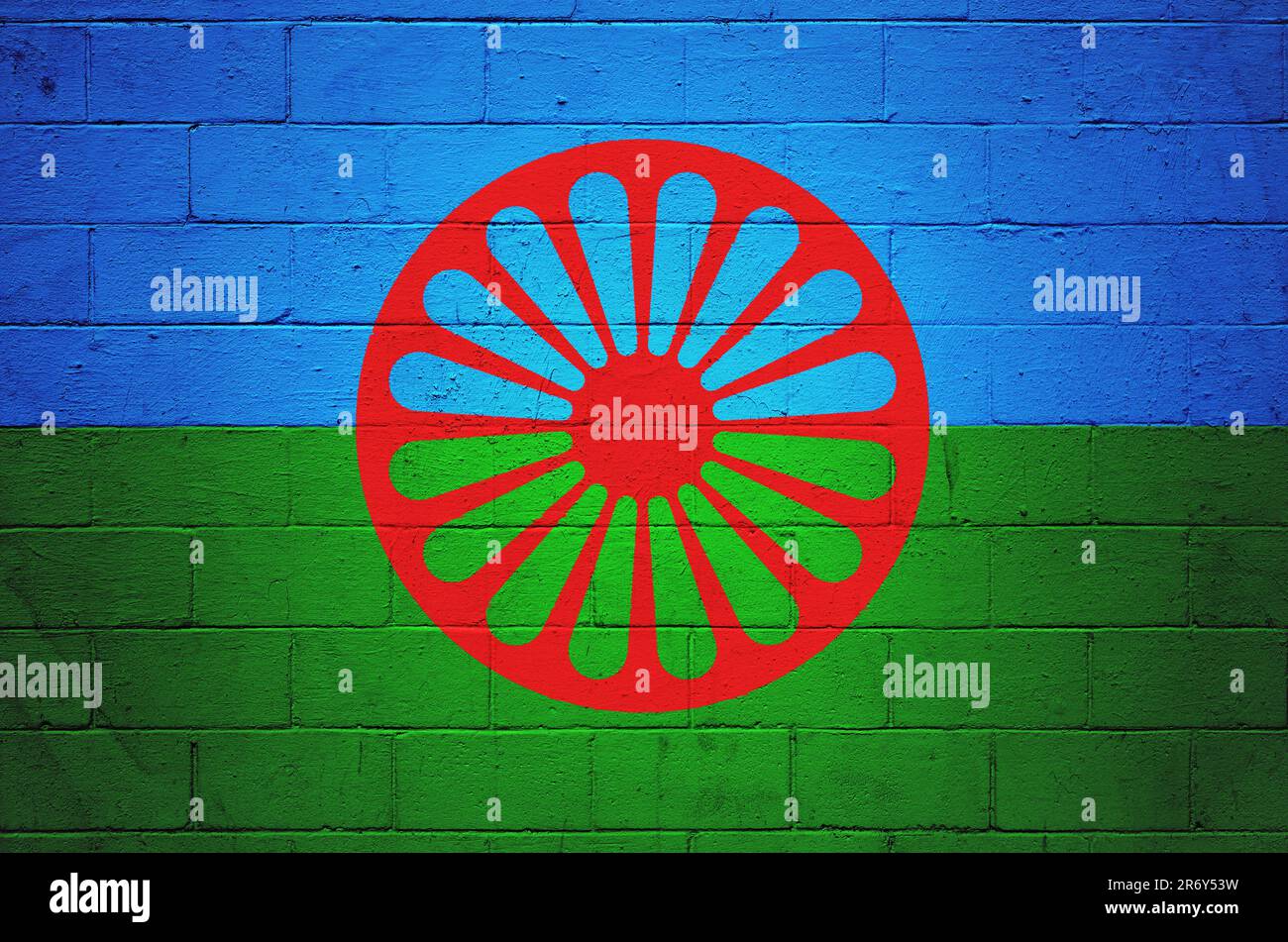 Flag of the Romani people painted on a cinder block wall Stock Photo - Alamy