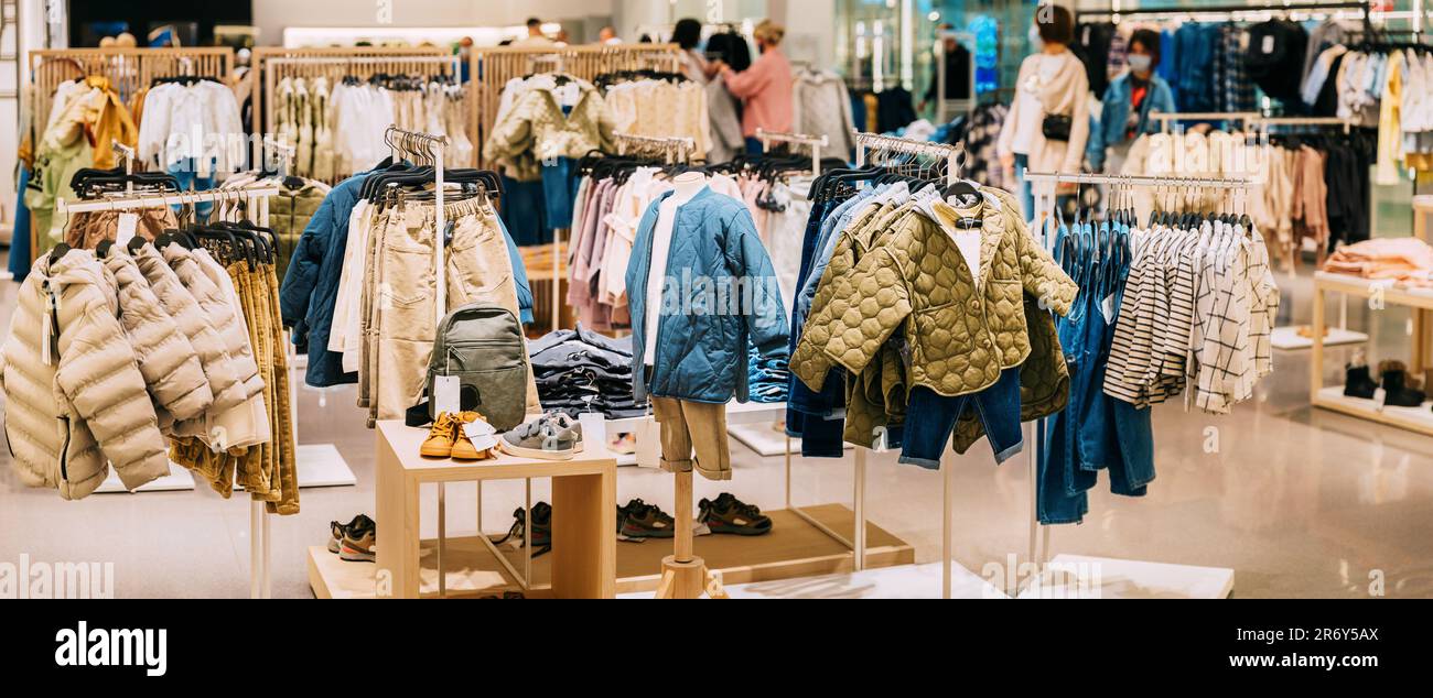 Children Male Man Casual Clothes And Children Clothes On Shelves And ...