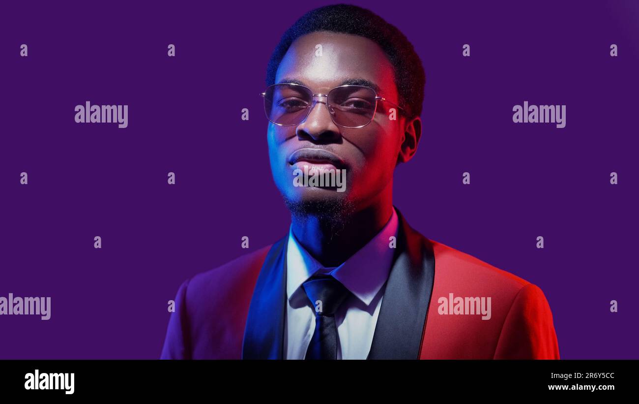Neon light man classy style. Dandy look. Portrait of confident ...