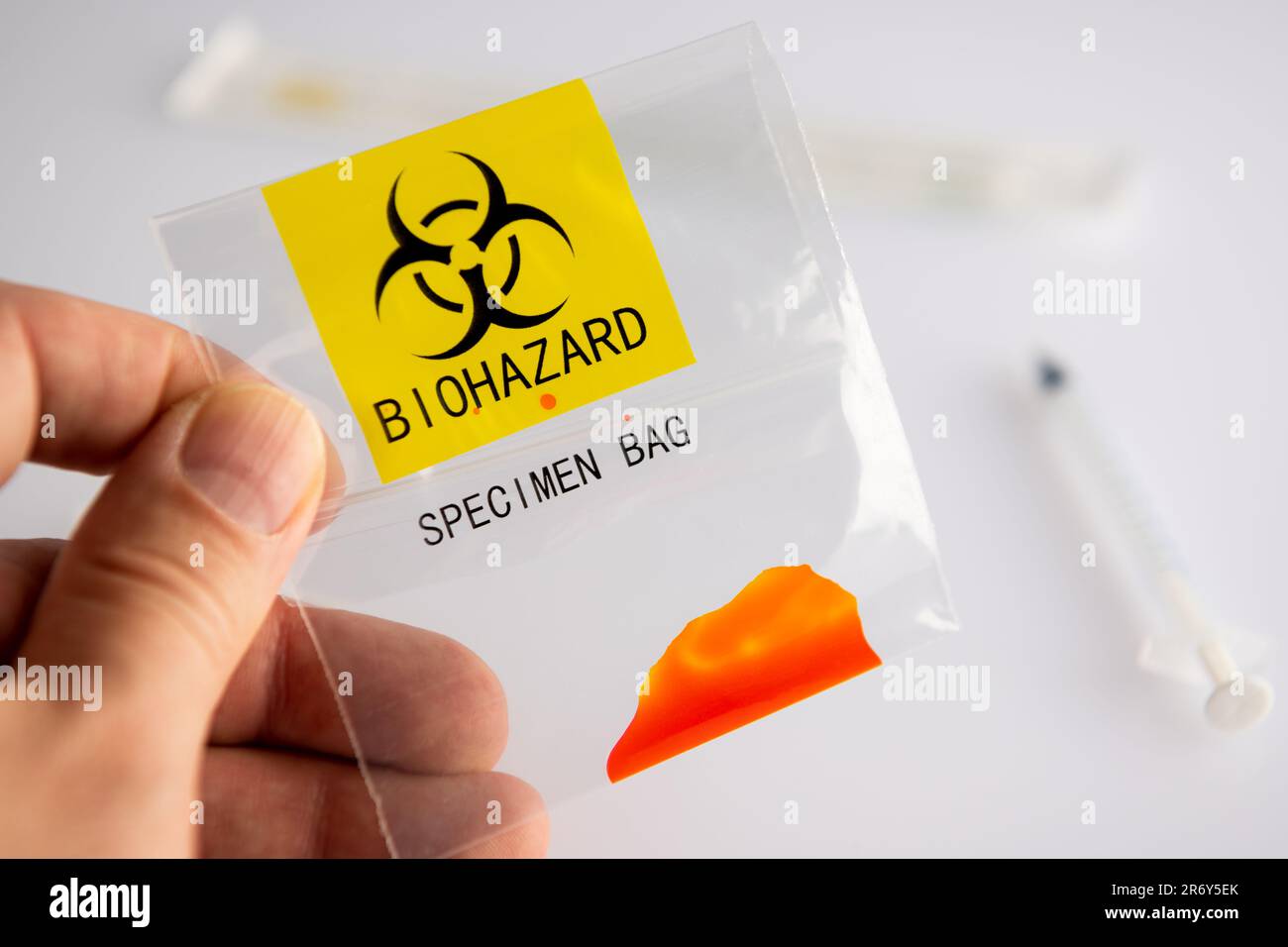 Biohazard specimen plastic bag on a white background Stock Photo - Alamy