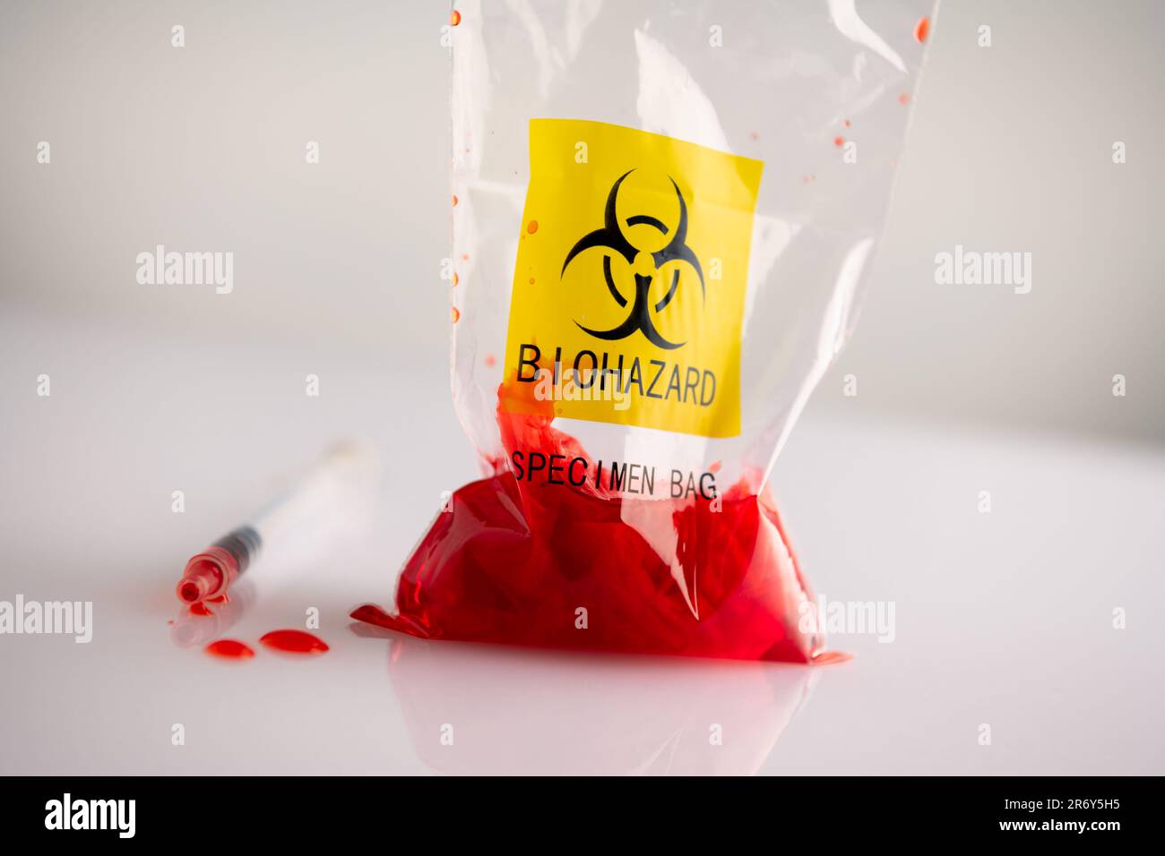 Biohazard specimen plastic bag on a white background Stock Photo - Alamy