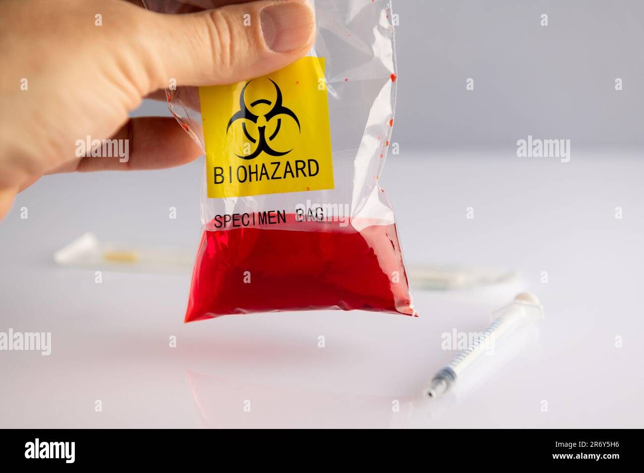 Biohazard specimen plastic bag on a white background Stock Photo - Alamy