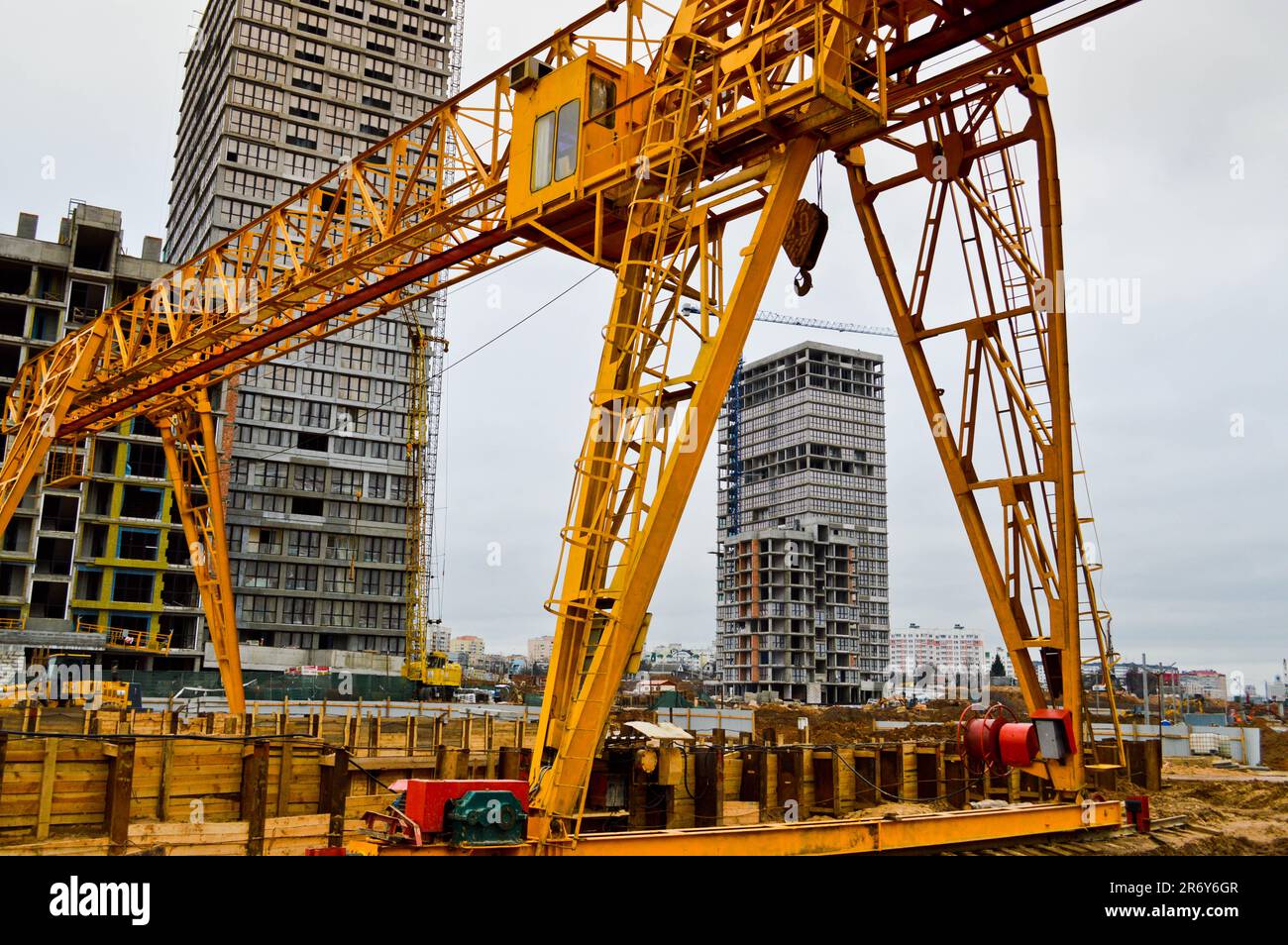 A construction site with specialized professional equipment and cranes ...