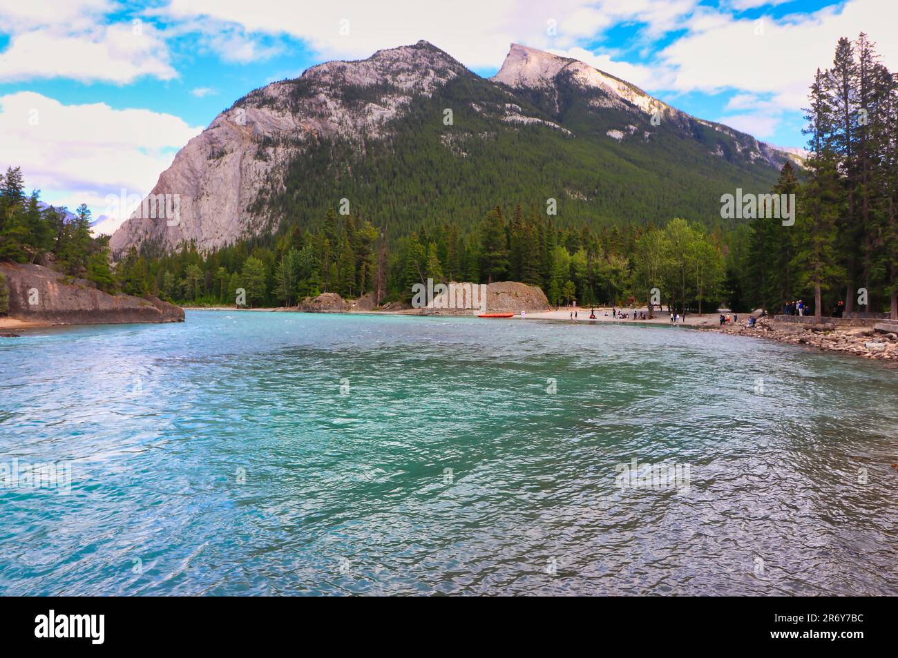Bow River flows past the Rundle mountain range in Banff in the Canada ...