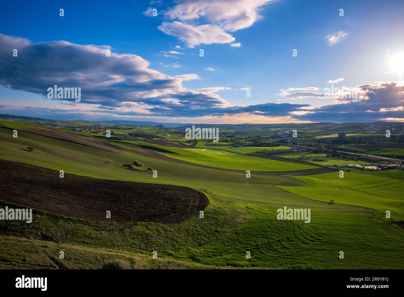 Endless Green Fields from Above with Stunning Sky and Setting Sun Stock ...