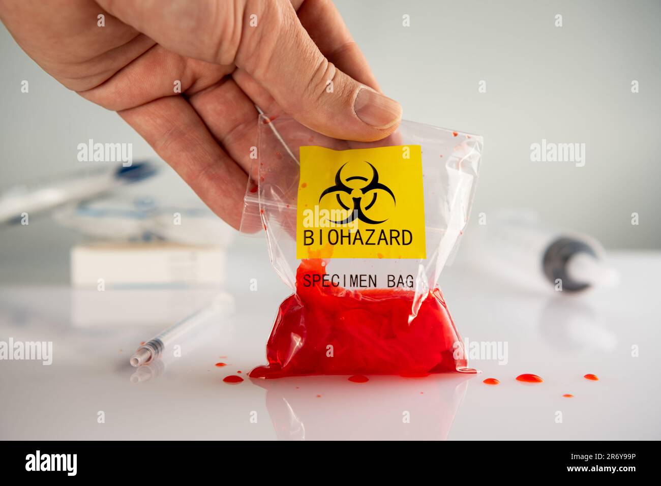 Biohazard specimen plastic bag on a white background Stock Photo - Alamy