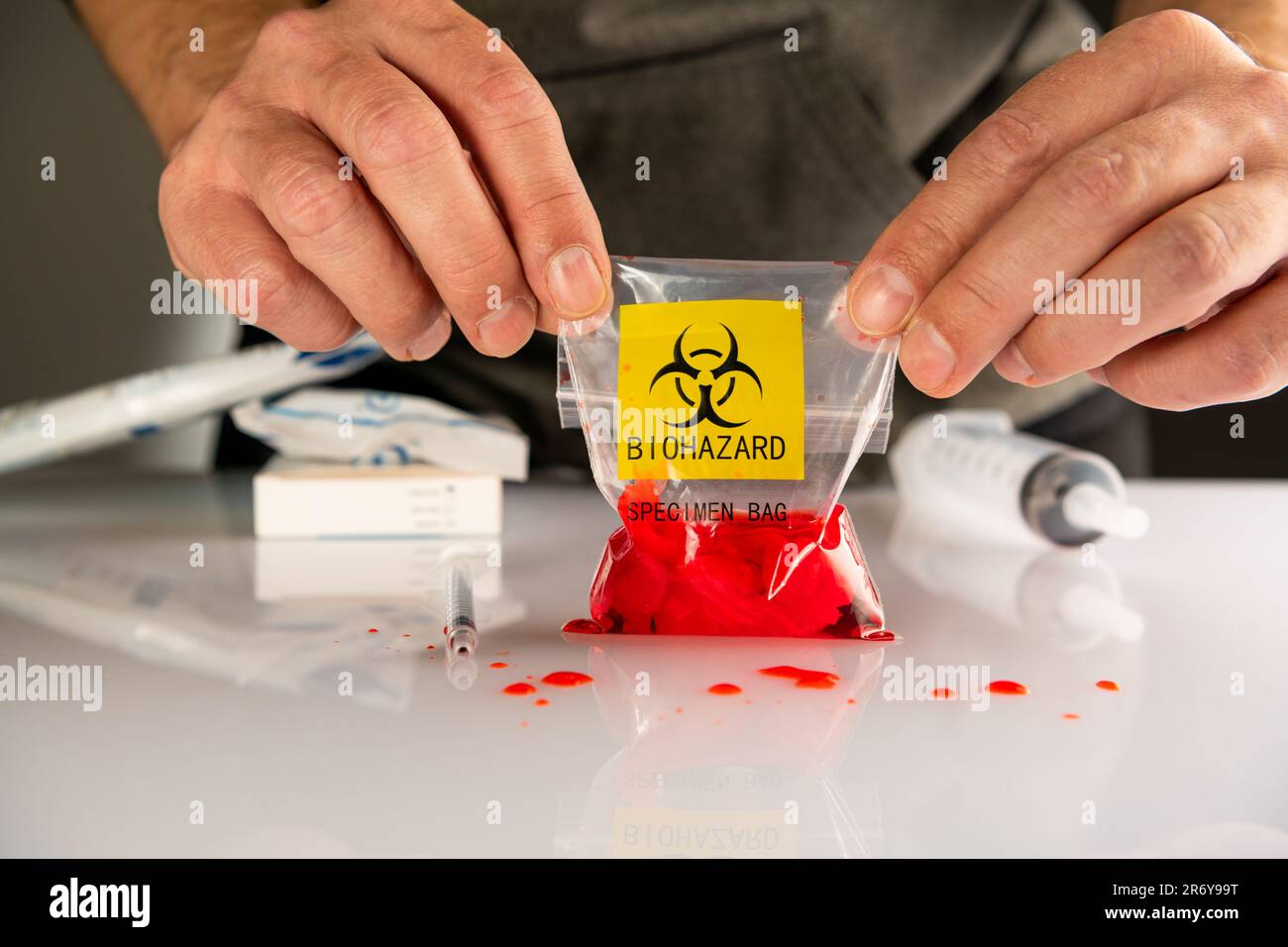 Biohazard specimen plastic bag on a white background Stock Photo - Alamy
