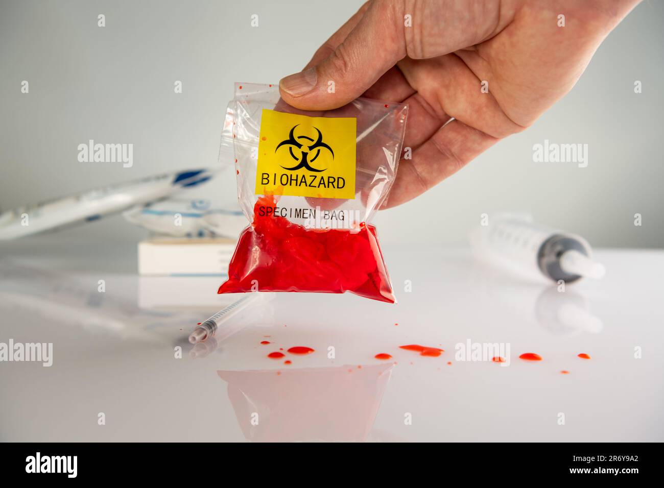 Biohazard specimen plastic bag on a white background Stock Photo - Alamy