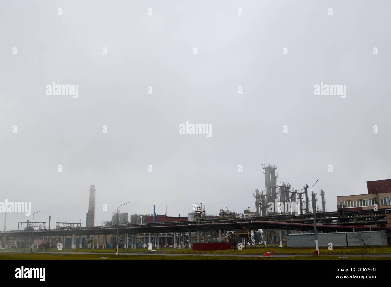 Oil refinery, petrochemical plant, in cloudy weather, fog Stock Photo ...