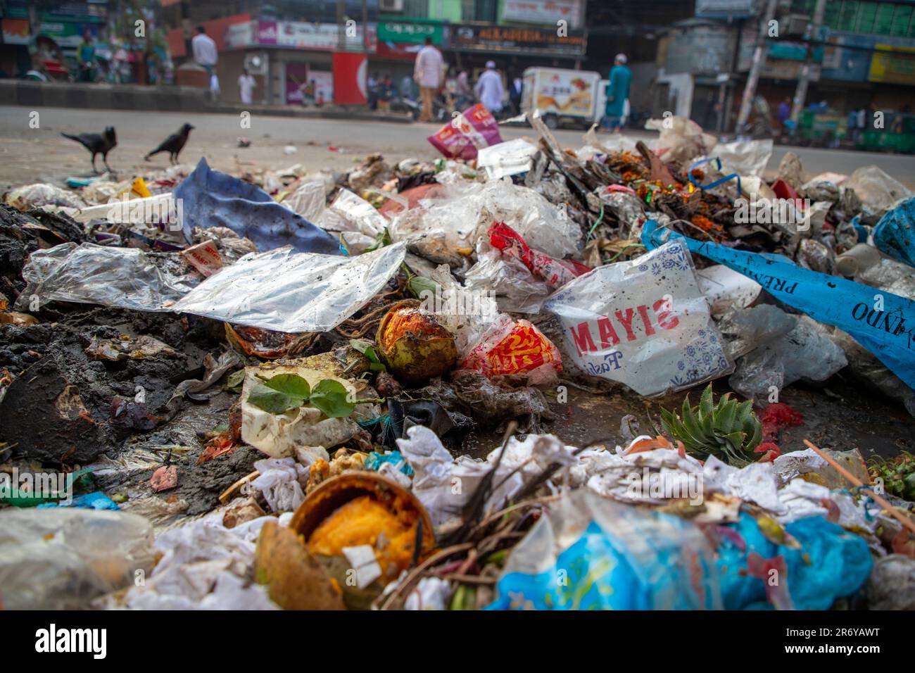 Plastic and other garbage littered of the road at Dhaka, the capital ...