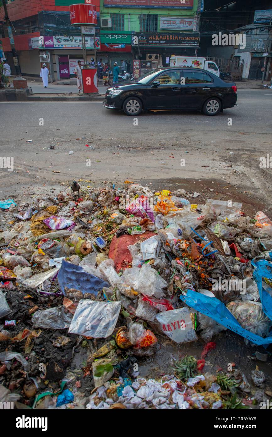 Plastic and other garbage littered of the road at Dhaka, the capital ...