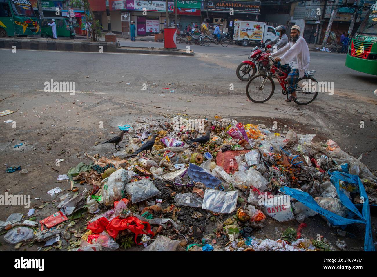 Plastic and other garbage littered of the road at Dhaka, the capital ...