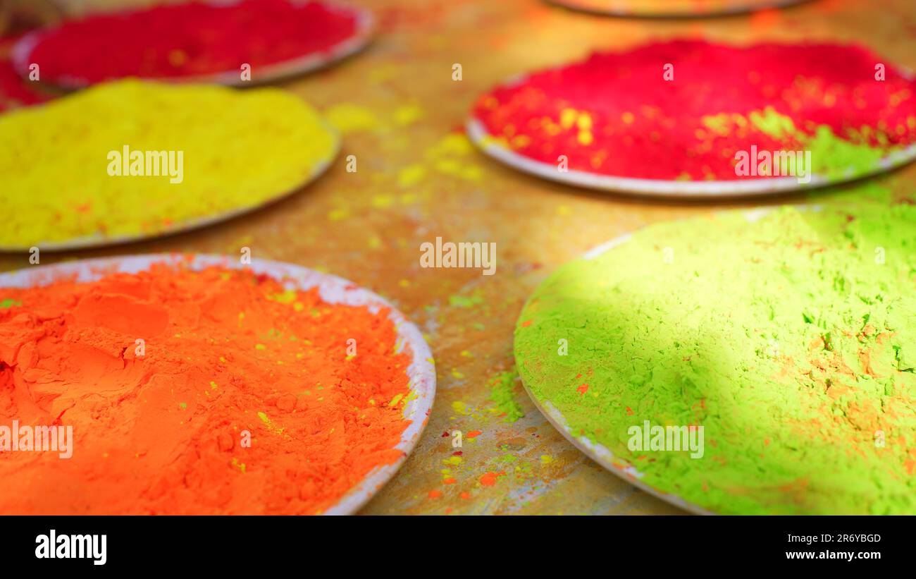 Colorful traditional holi powder in bowls isolated on festival ...