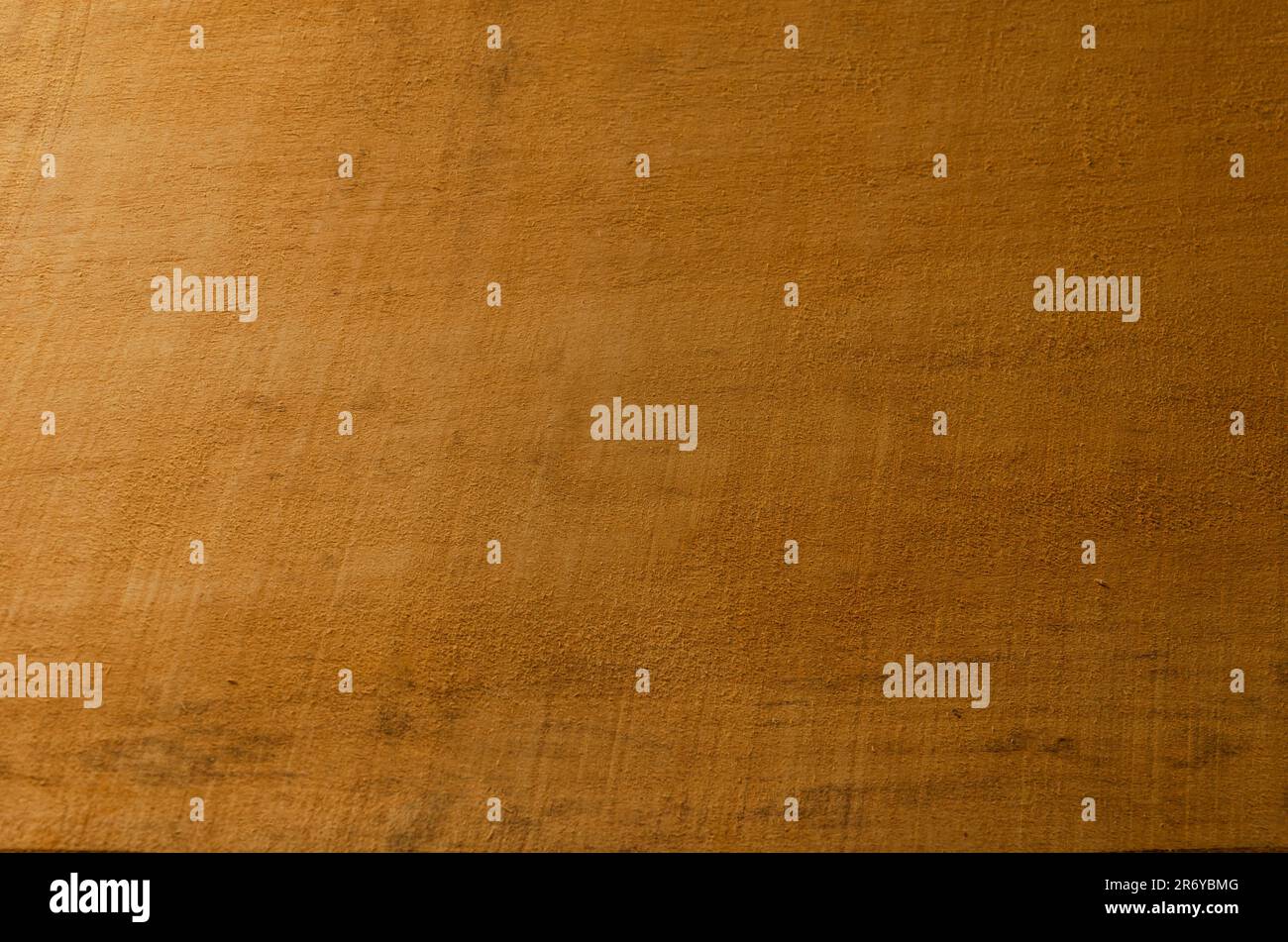 A brown background of lime wood with tight grain and copy space ideal ...