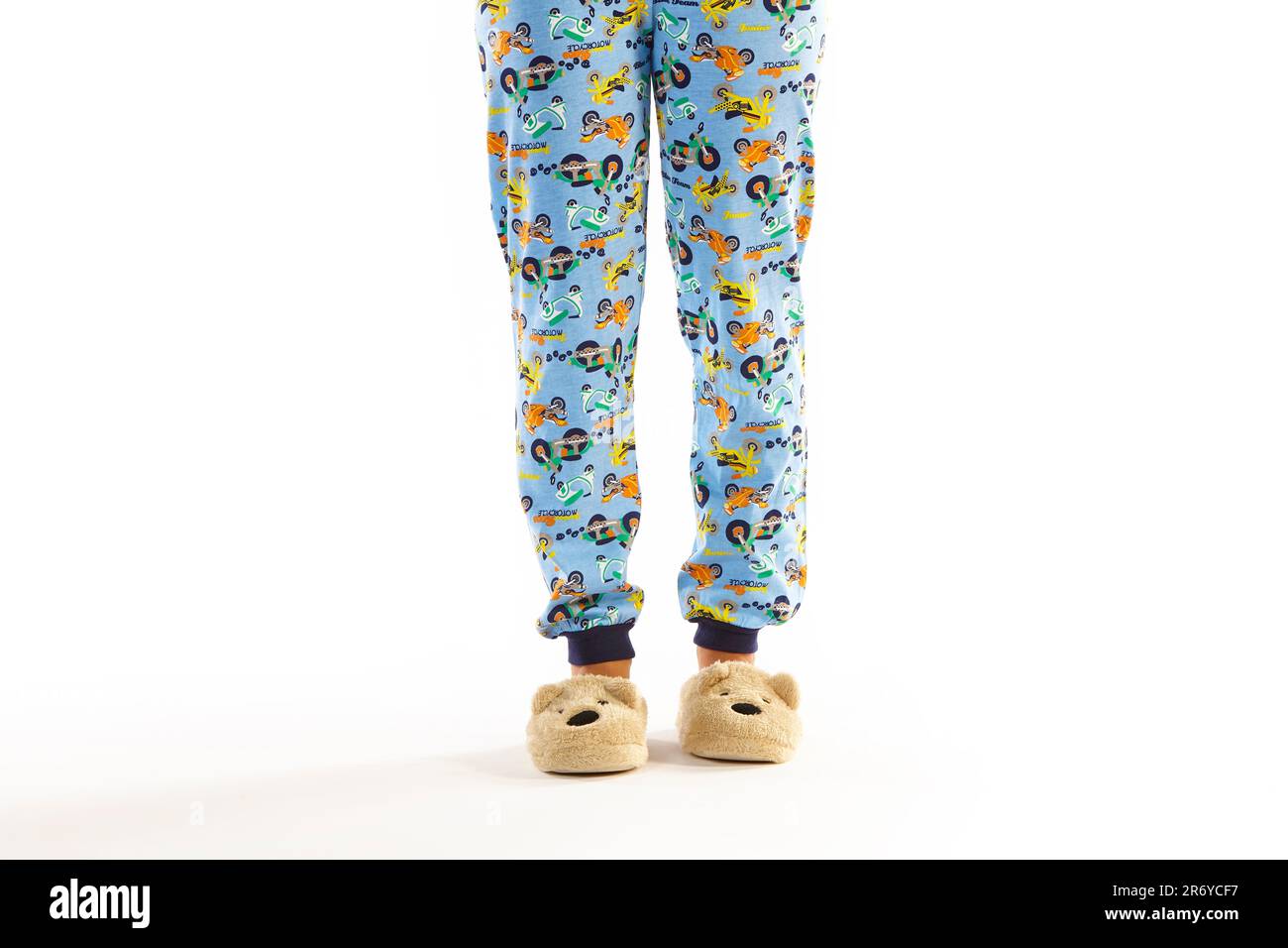 Boy in pajama. White background. Legs detail. Night wear Stock Photo ...