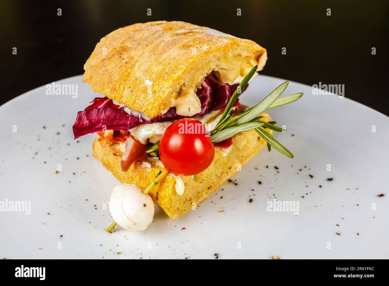 A plate of Italian breakfast featuring fresh vegetables, mozzarella and ...