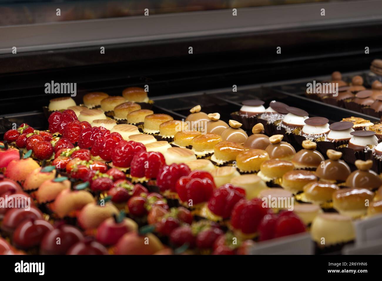 a mignon high pastry showcase Stock Photo - Alamy