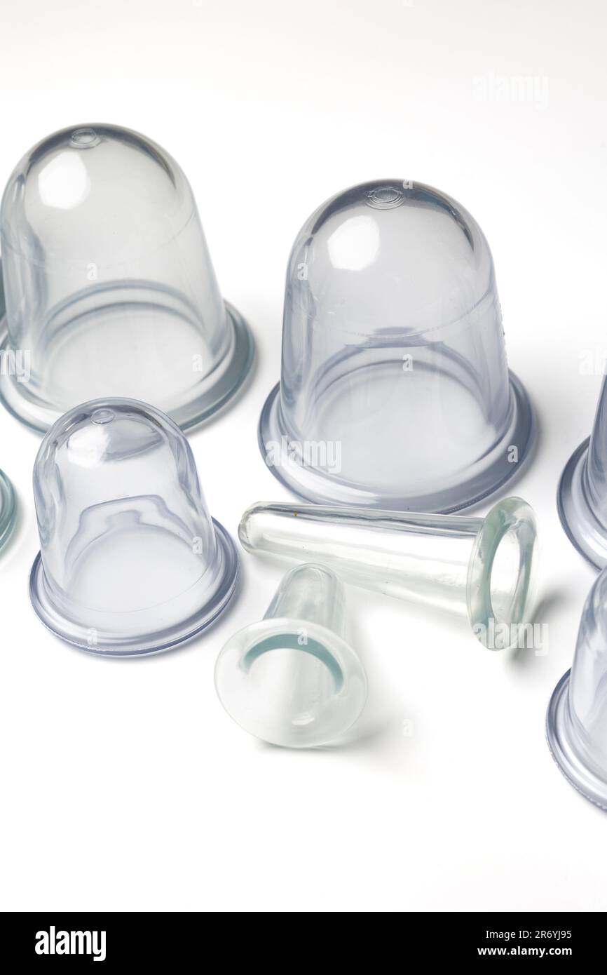 A collection of cups for cupping massage on the white background Stock ...