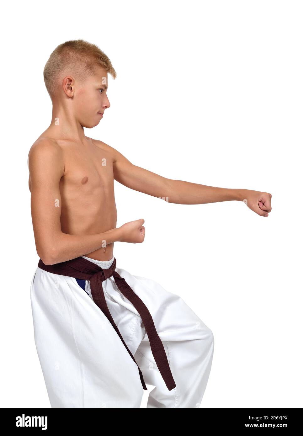 karate boy with a muscle strain on white background Stock Photo - Alamy