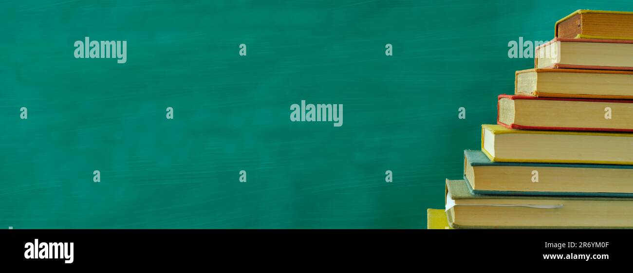 Stack of multicolored books forming a staircase,ladder of success ...