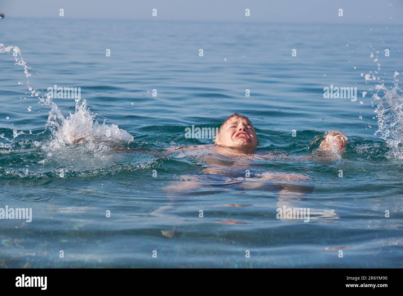 Save drowning child hi-res stock photography and images - Alamy