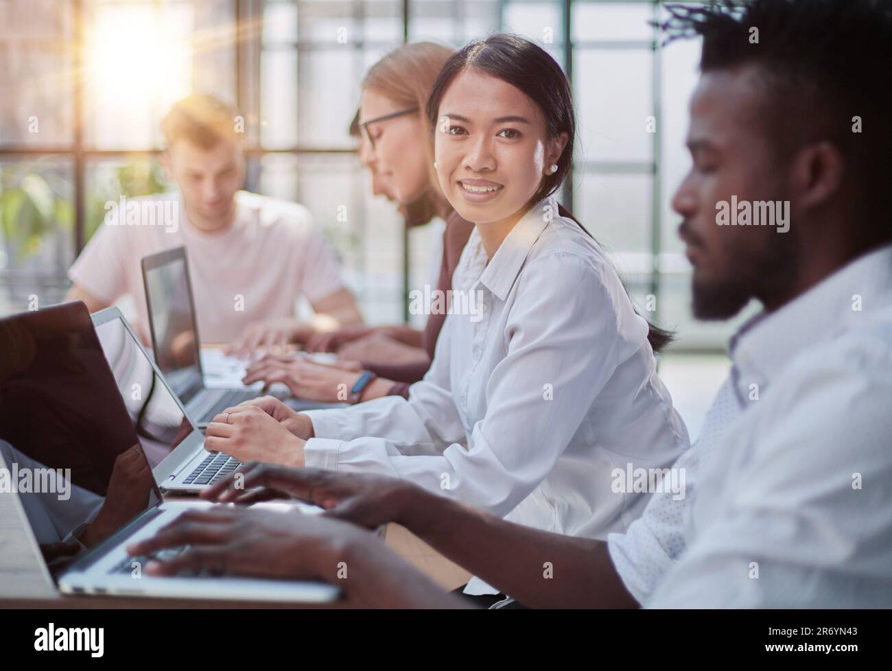 group of successful business people working in the office Stock Photo ...
