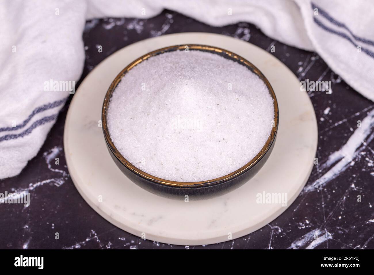 Non-iodized salt on dark background. Natural minaret non-iodized ...