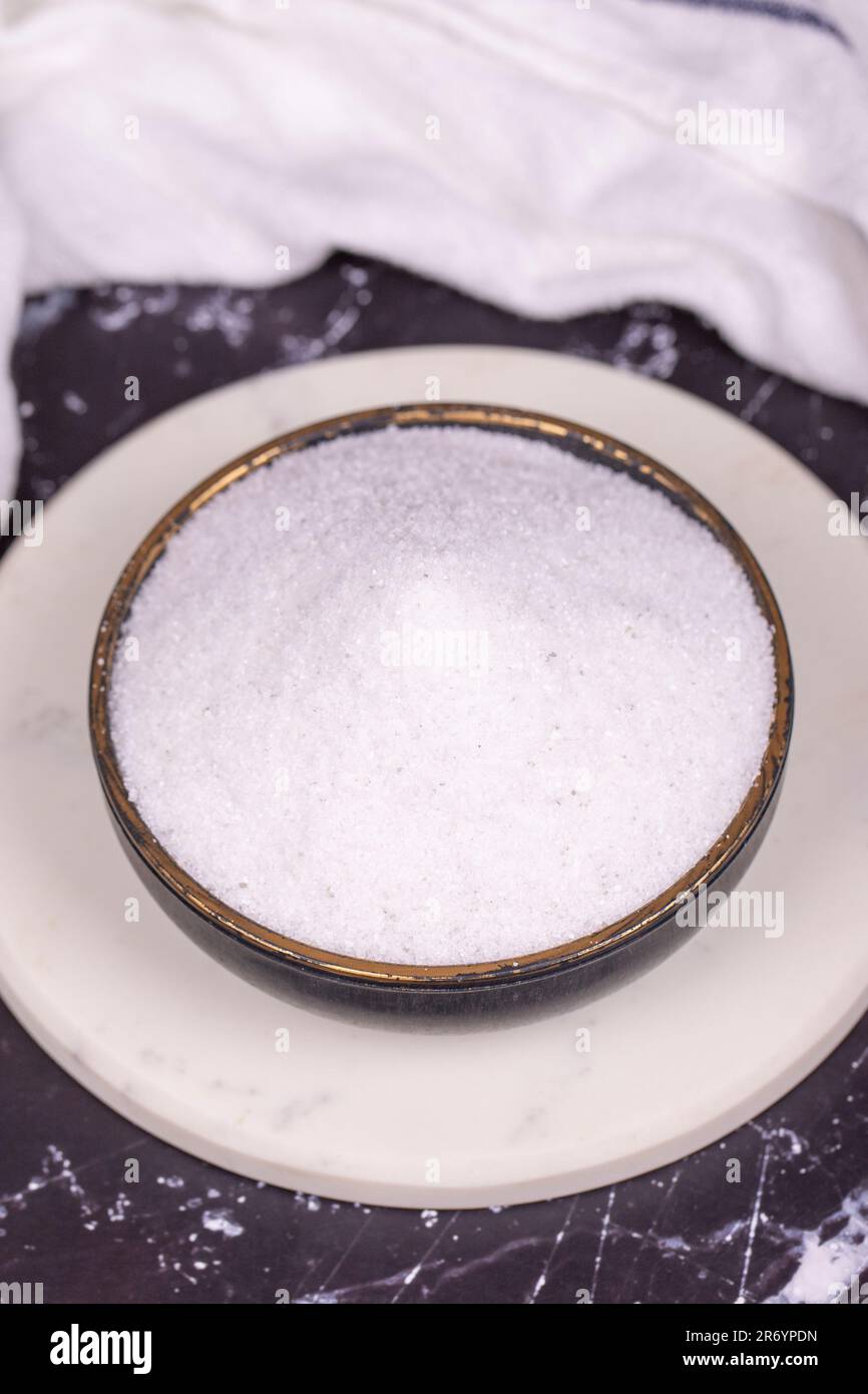 Non-iodized salt on dark background. Natural minaret non-iodized ...
