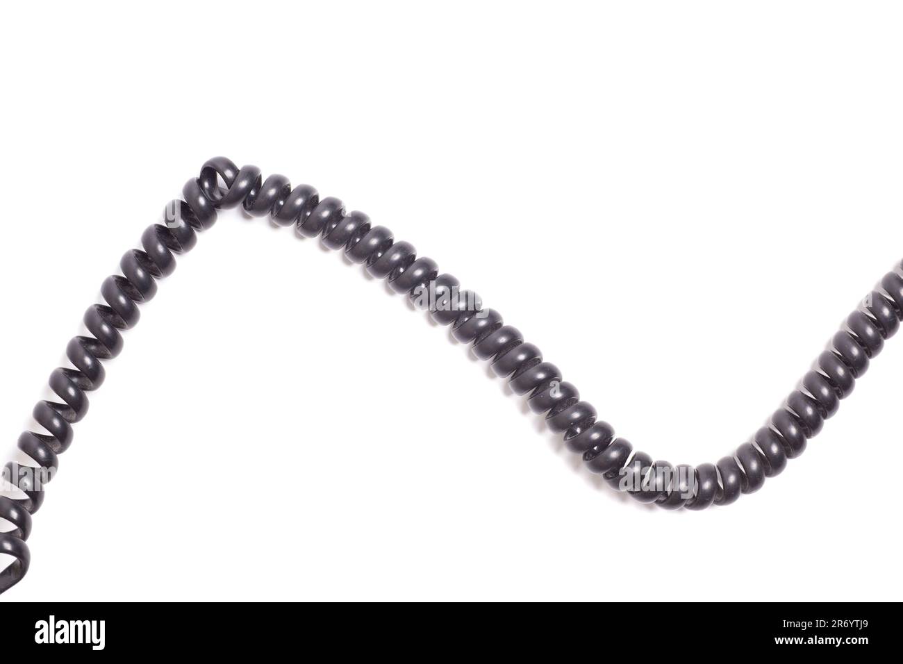 Black spiral telephone cord isolated on white background Stock Photo ...