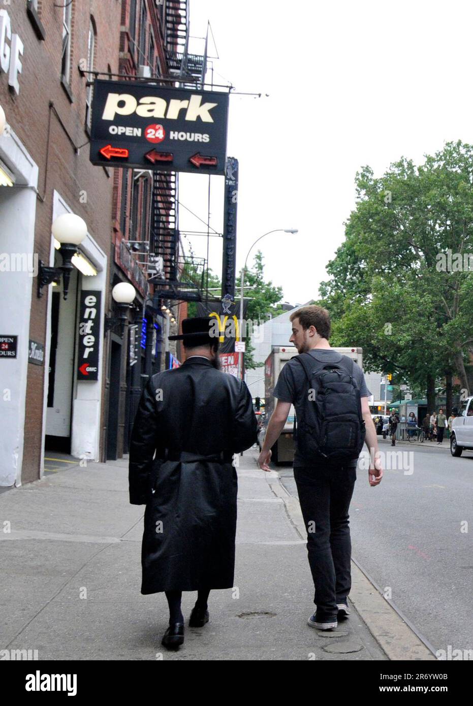 A Jewish Orthodox man talking to an atheist man in Manhattan, NYC Stock ...