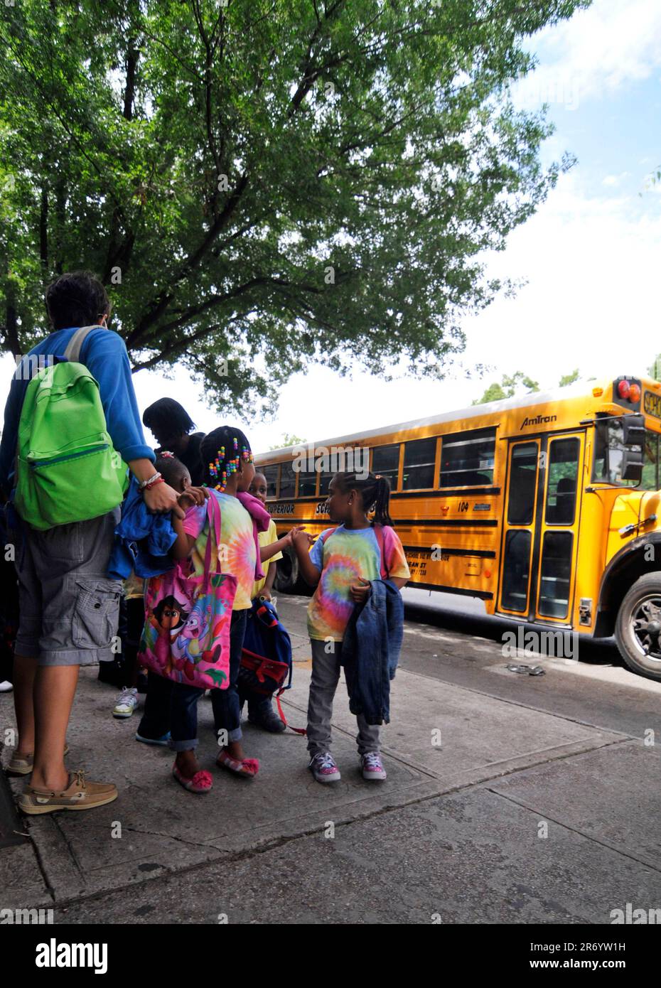 Children waiting school bus hi-res stock photography and images - Alamy