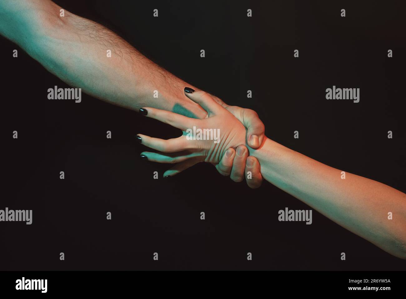 Helping hand. Holding hands, close up. Giving a helping hand. Rescue ...