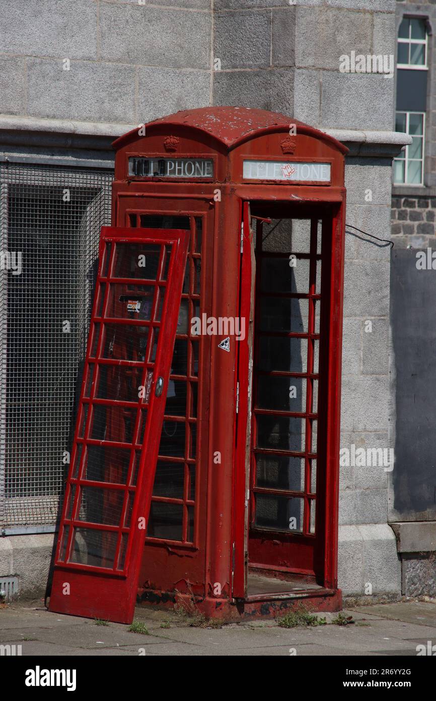 Old red phone box with door off hi-res stock photography and images - Alamy