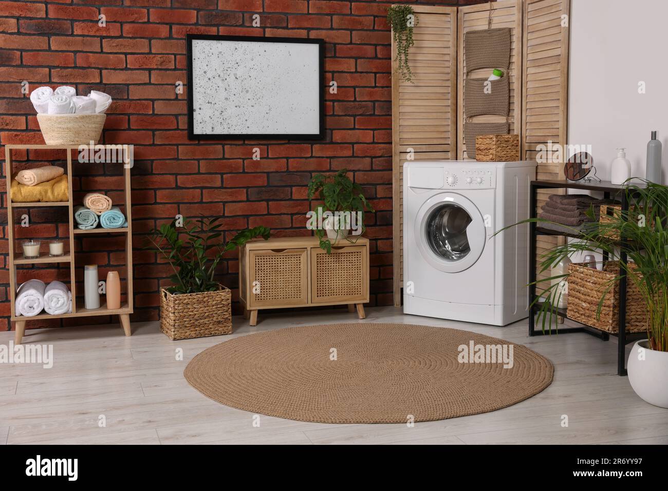 Stylish laundry room with washing machine. Interior design Stock Photo ...