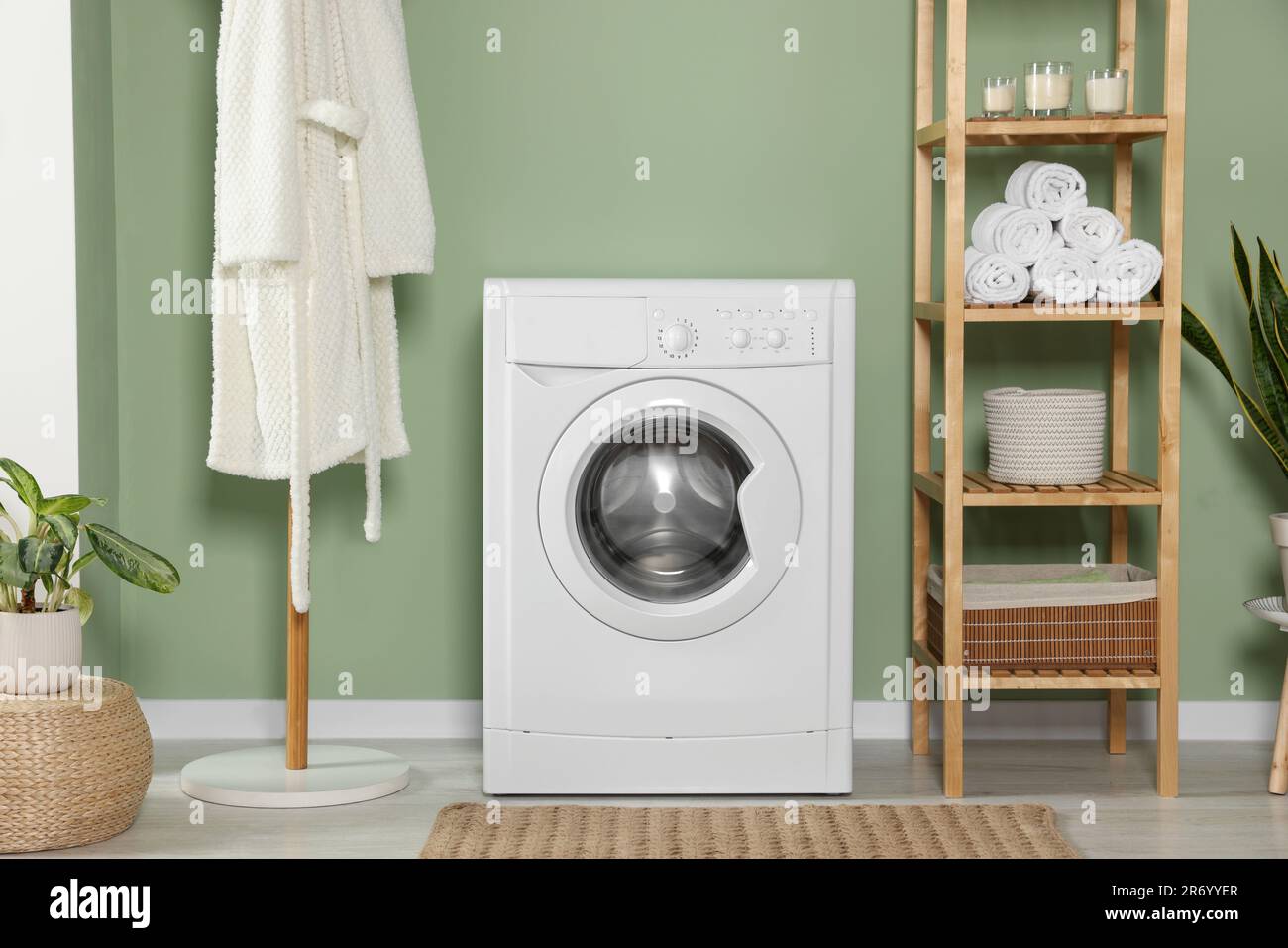 Stylish laundry room with washing machine. Interior design Stock Photo ...