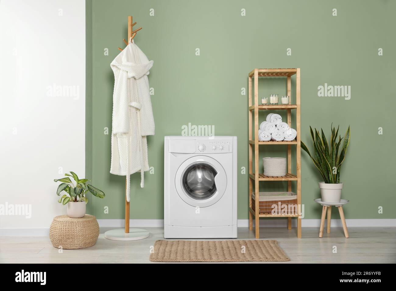 Stylish laundry room with washing machine. Interior design Stock Photo ...