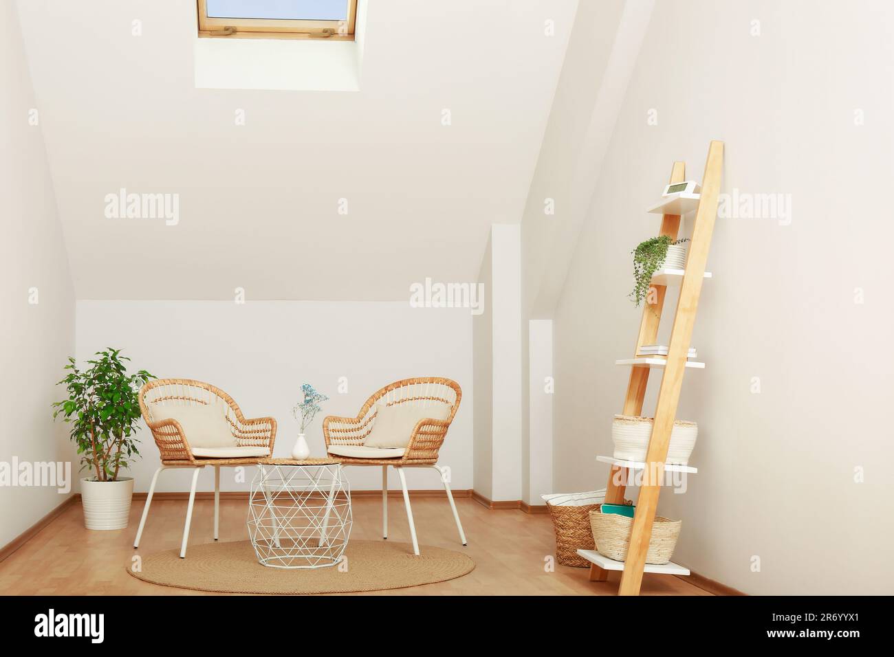 Attic room with stylish wooden furniture. Interior design Stock Photo ...