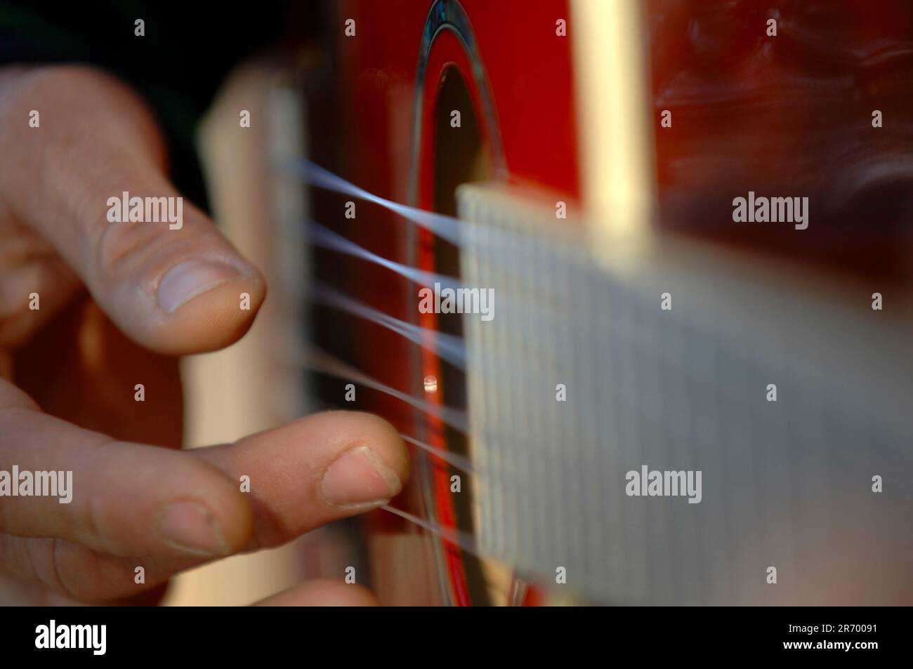 Mans hand playing acoustic guitar hi-res stock photography and images ...