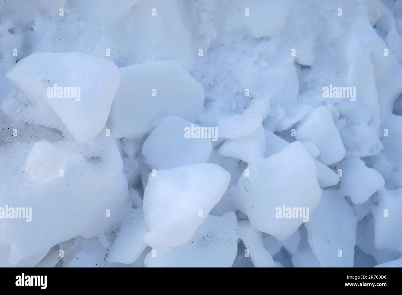 texture of blue snow in a snowdrift in winter close-up Stock Photo - Alamy