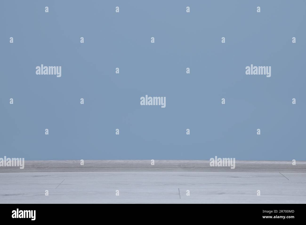 Beautiful light blue wall in clean empty room Stock Photo - Alamy
