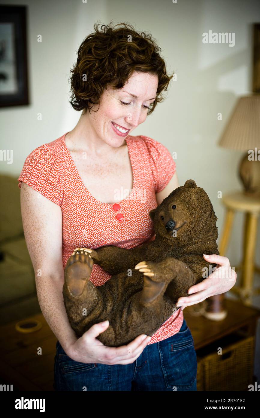Woman cradles hi-res stock photography and images - Alamy